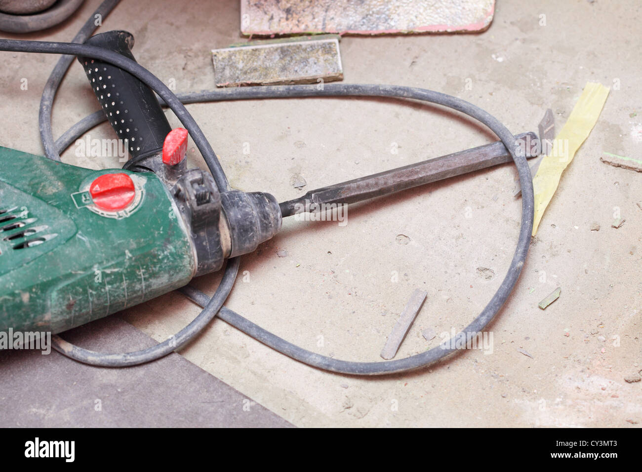 demolition hammer mason manual work floor tool worker Stock Photo - Alamy
