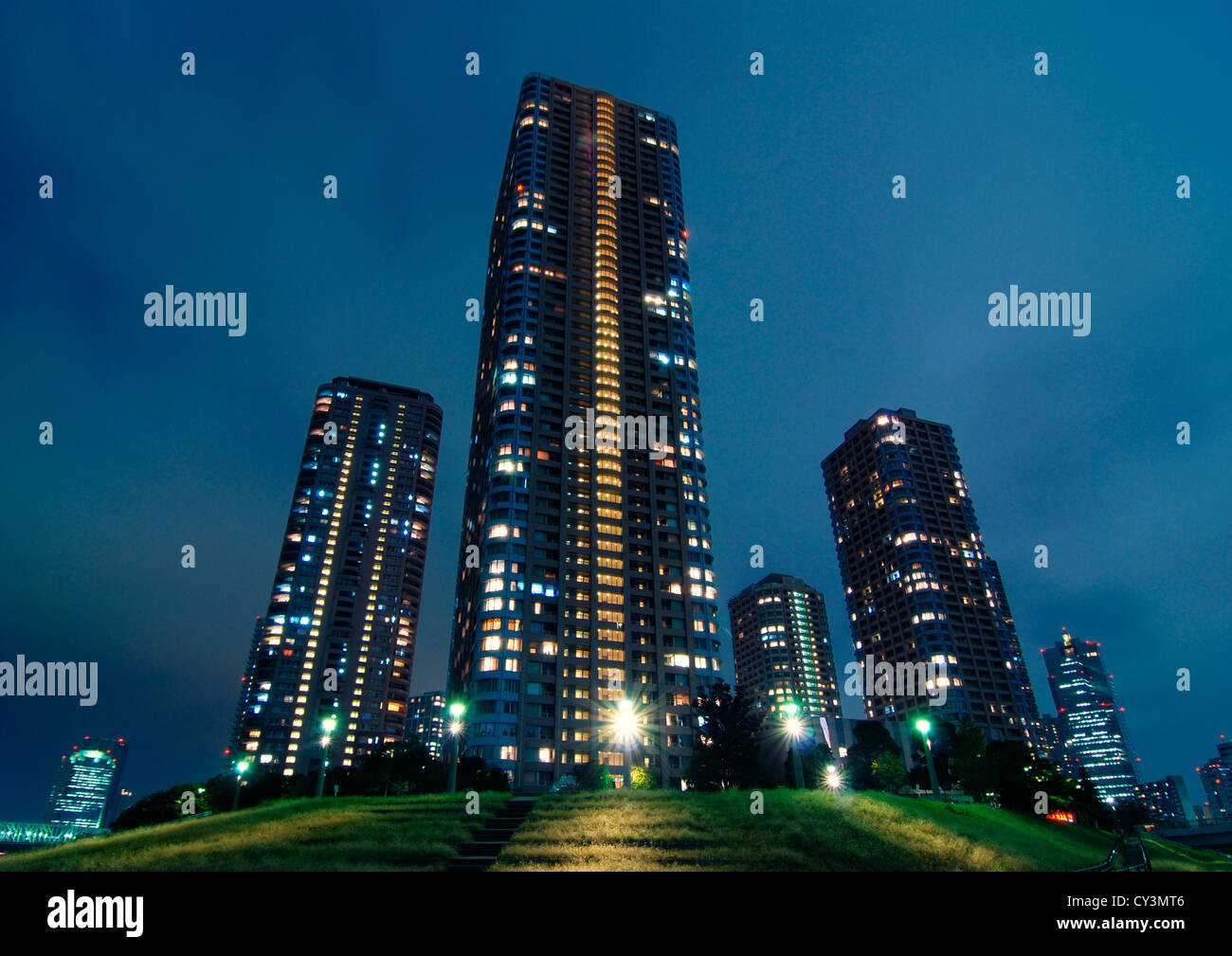 skyscraper buildings with night illumination inside modern Tokyo, Japan ...