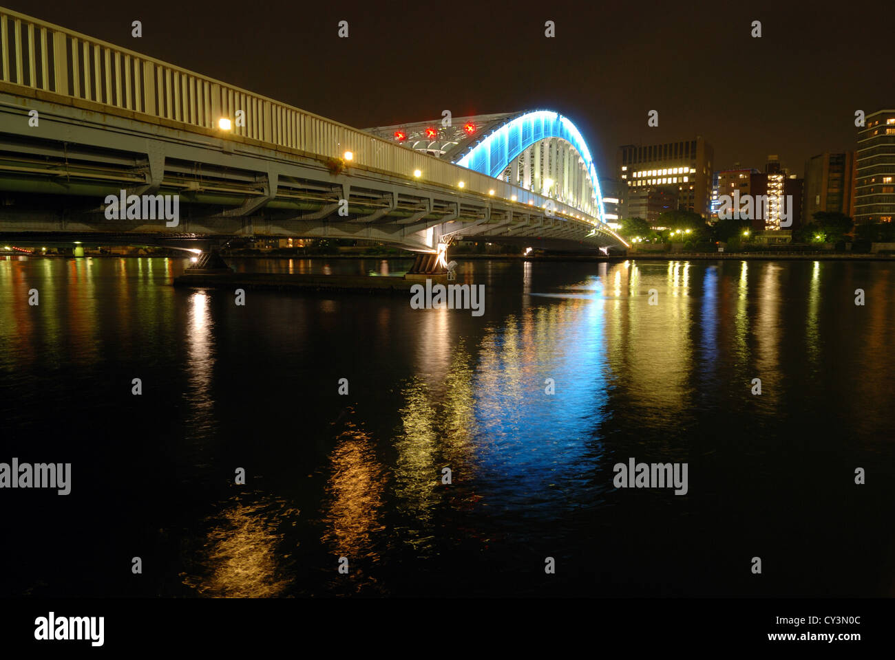 nighttime colorful reflection of Eitai Bridge illumination in waters of ...