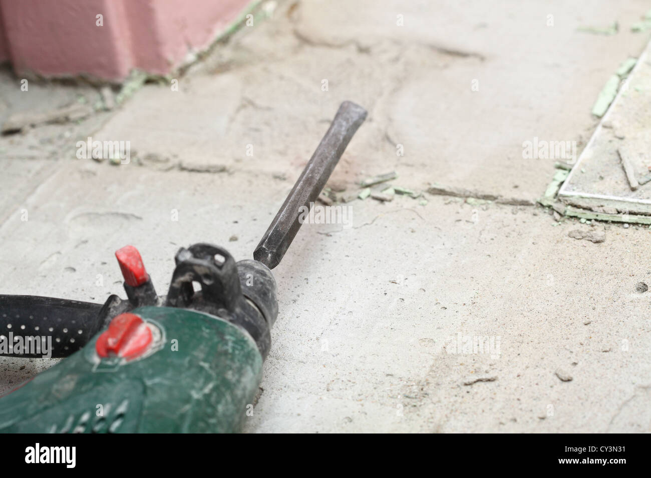 demolition hammer mason manual work floor tool worker Stock Photo - Alamy