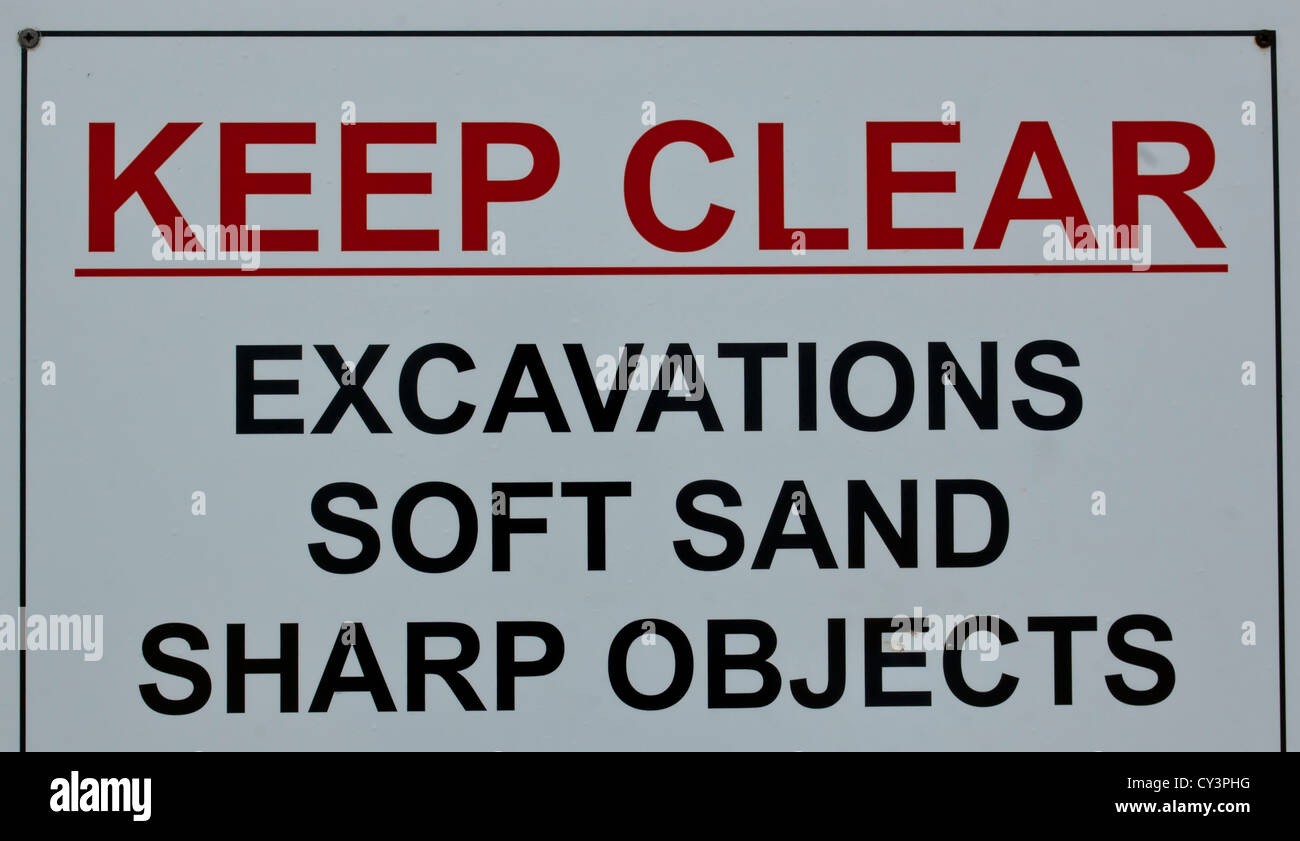 Danger soft sand on a beach Stock Photo - Alamy