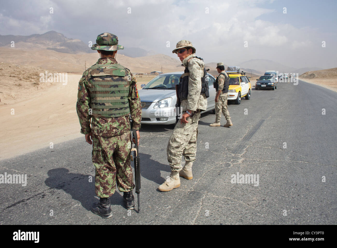 Afghan police and military checkpoint looking for suspected terrorists ...