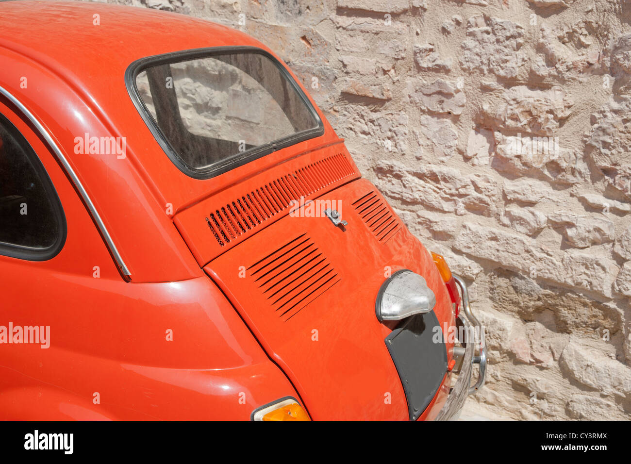 Little Italian car, back end , orange Stock Photo - Alamy