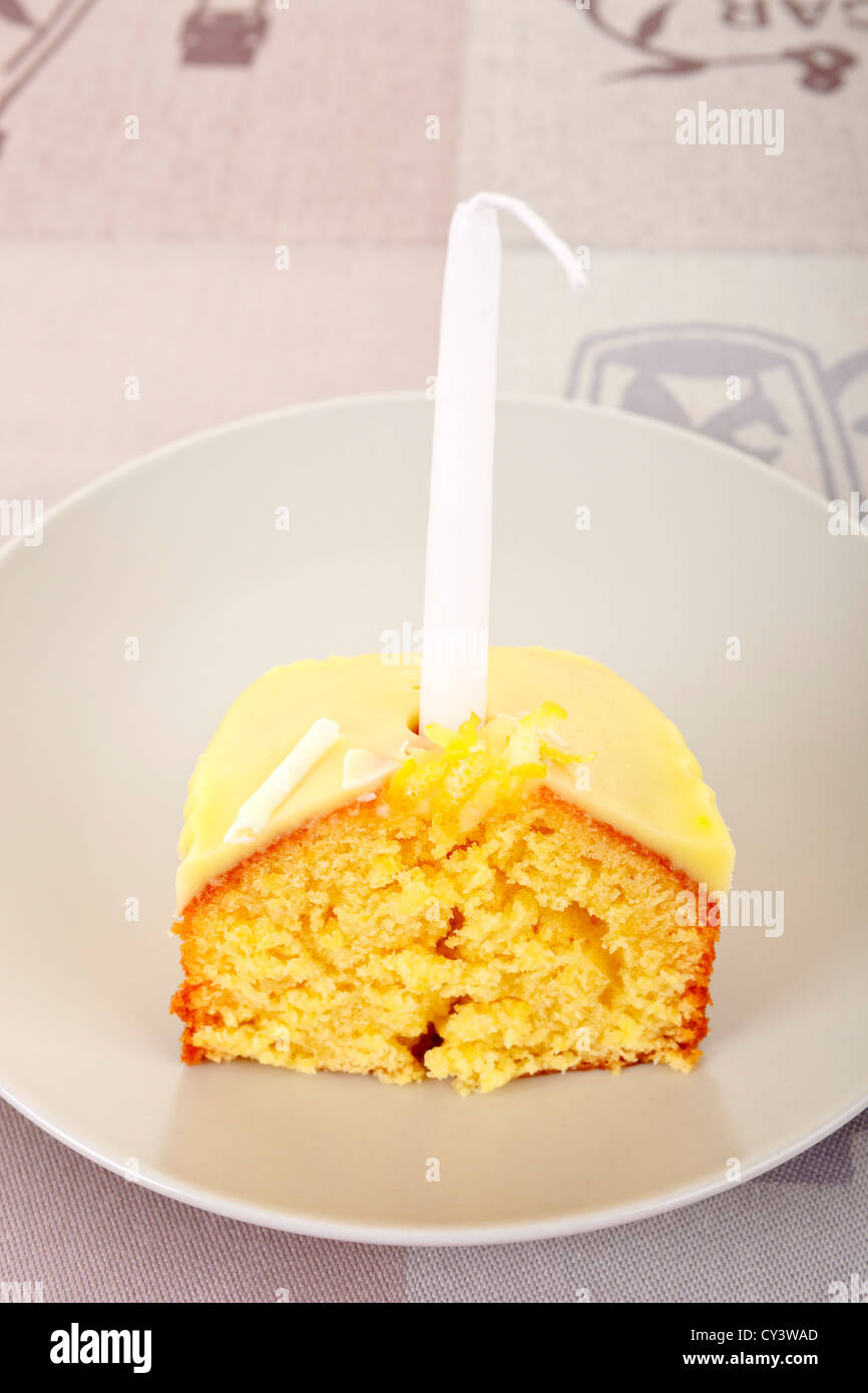 Birthday cake with one candle Stock Photo - Alamy