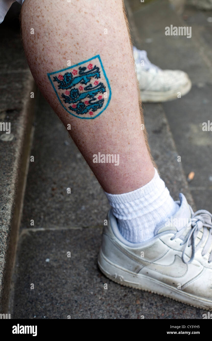 A Man With An England Football Tattoo On His Leg Hoxton Square