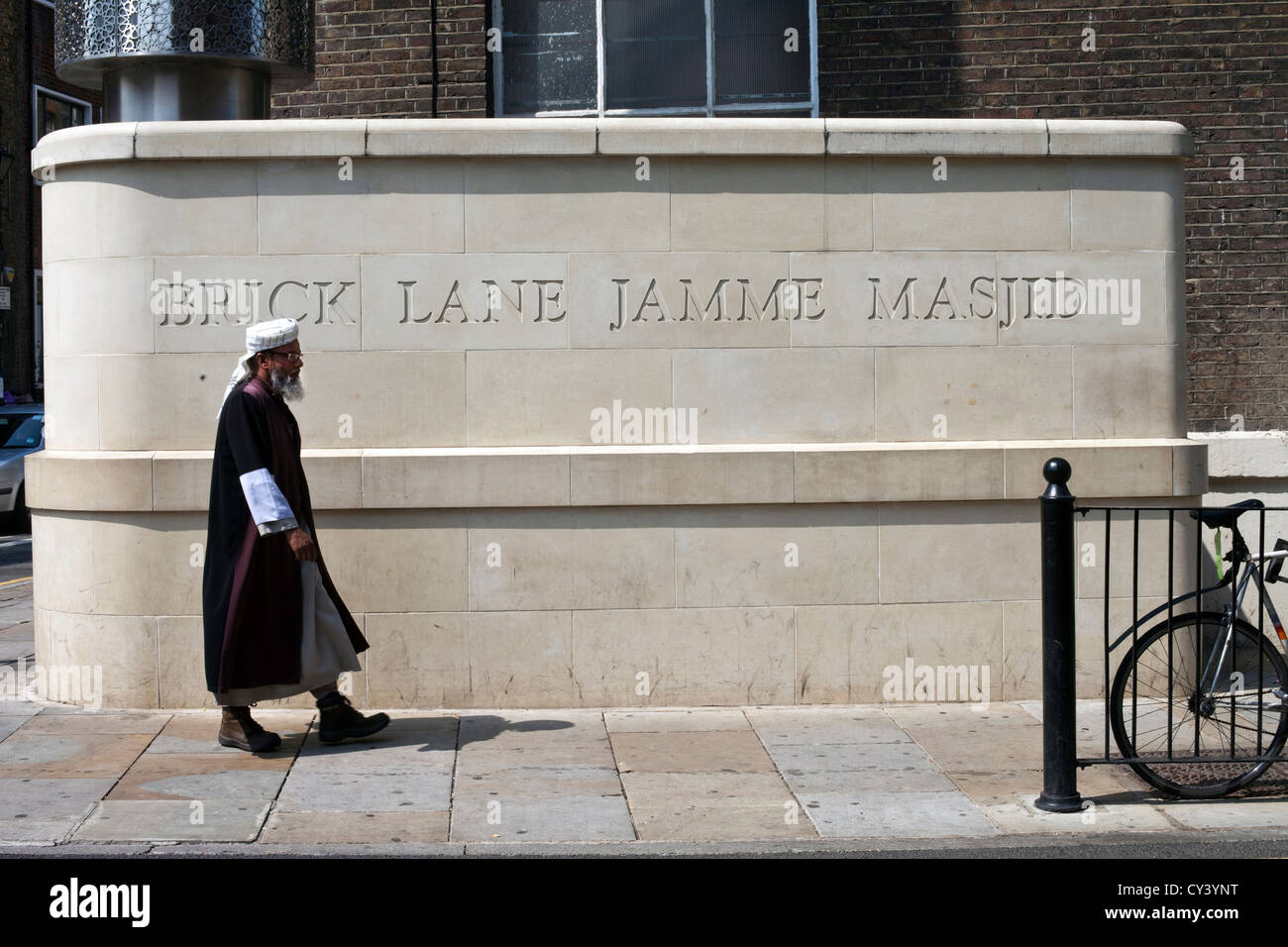 A man walks past the Mosque on Brick Lane, Spitalfields. London UK ...