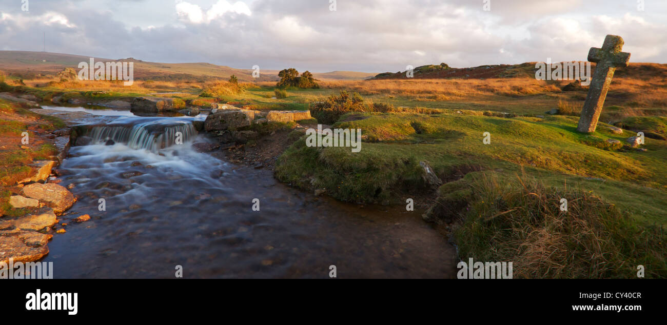 Windy Post old stone Cross on Dartmoor by a stream at sunset Stock ...