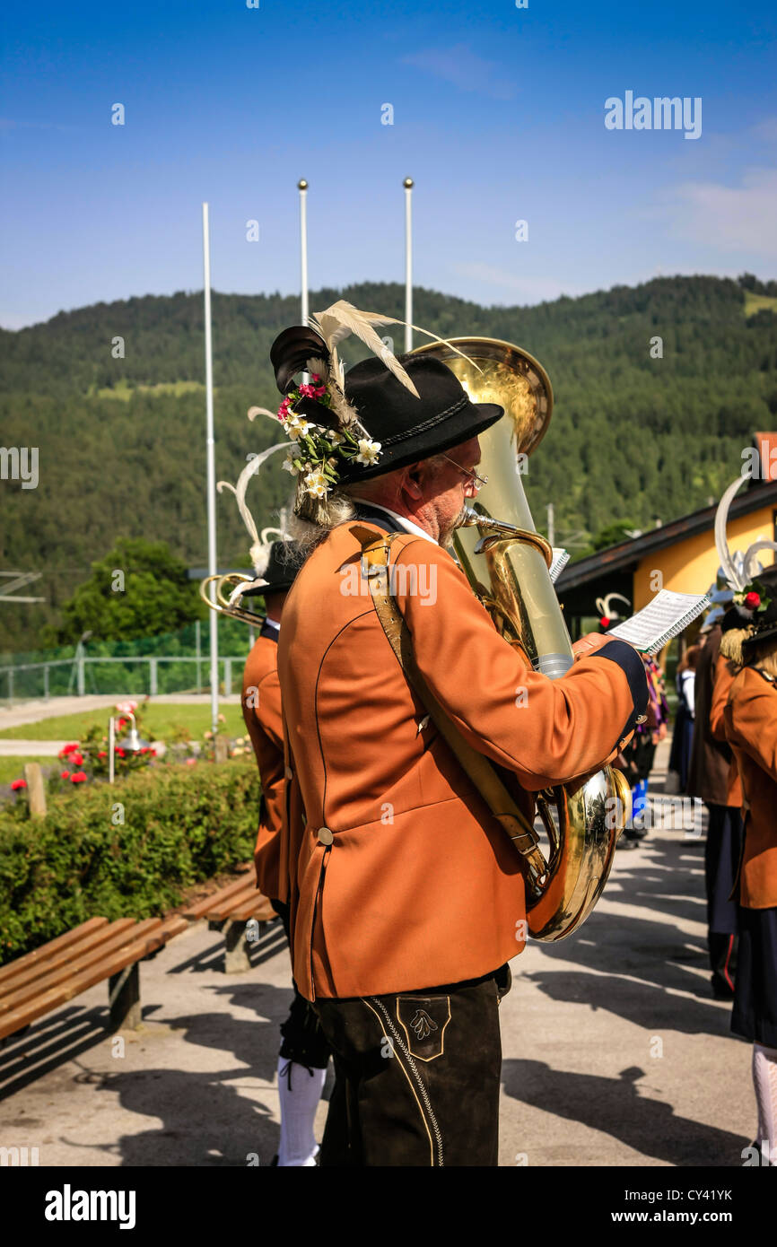 Members of the Seefeld Tyrolean band take part in a Sunday parade in ...