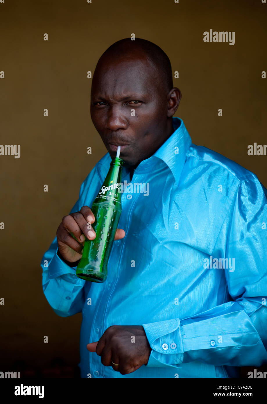 Abdallah Drinking Sprite - Rwanda Stock Photo - Alamy