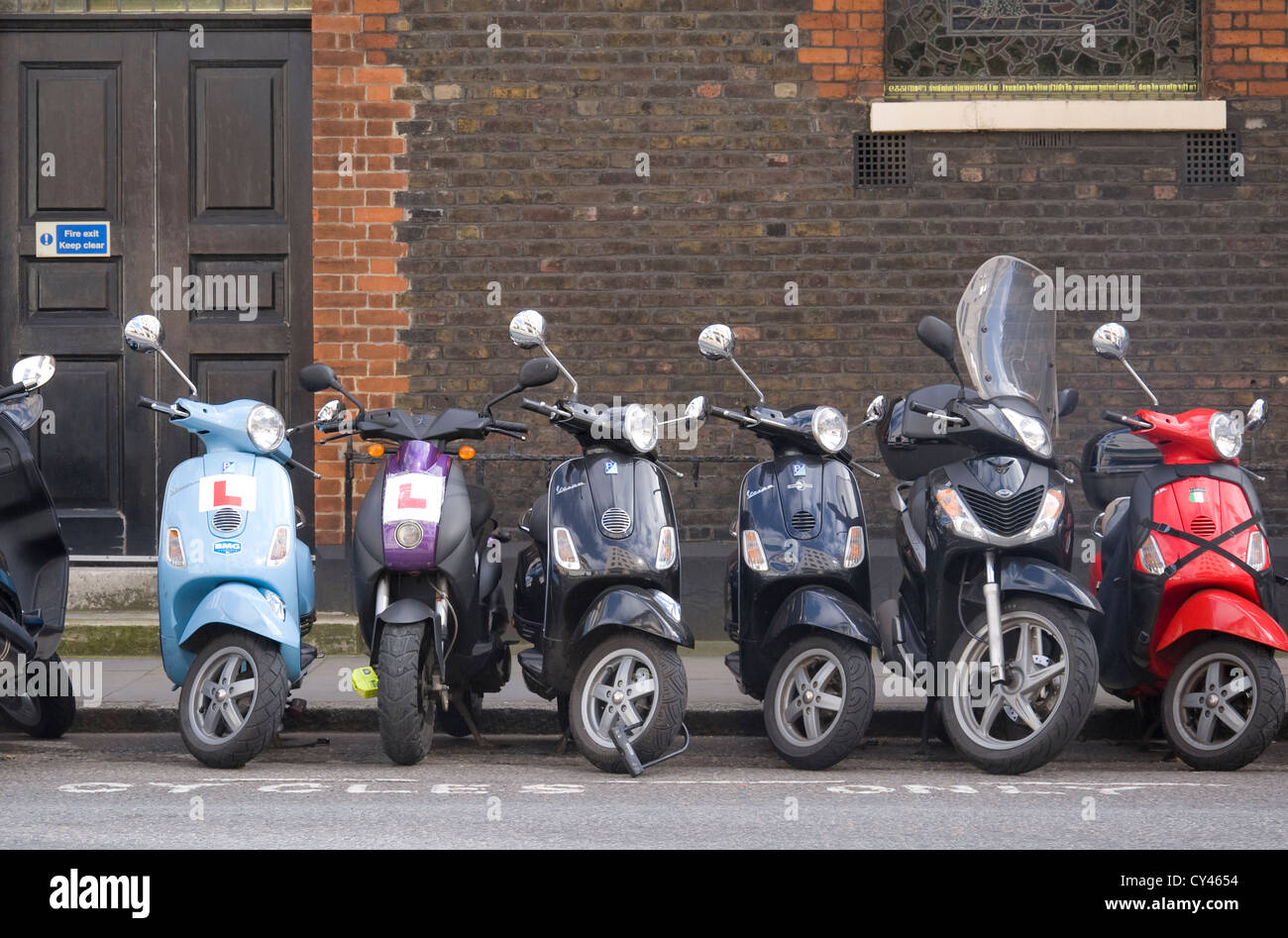 vespas in london Stock Photo - Alamy