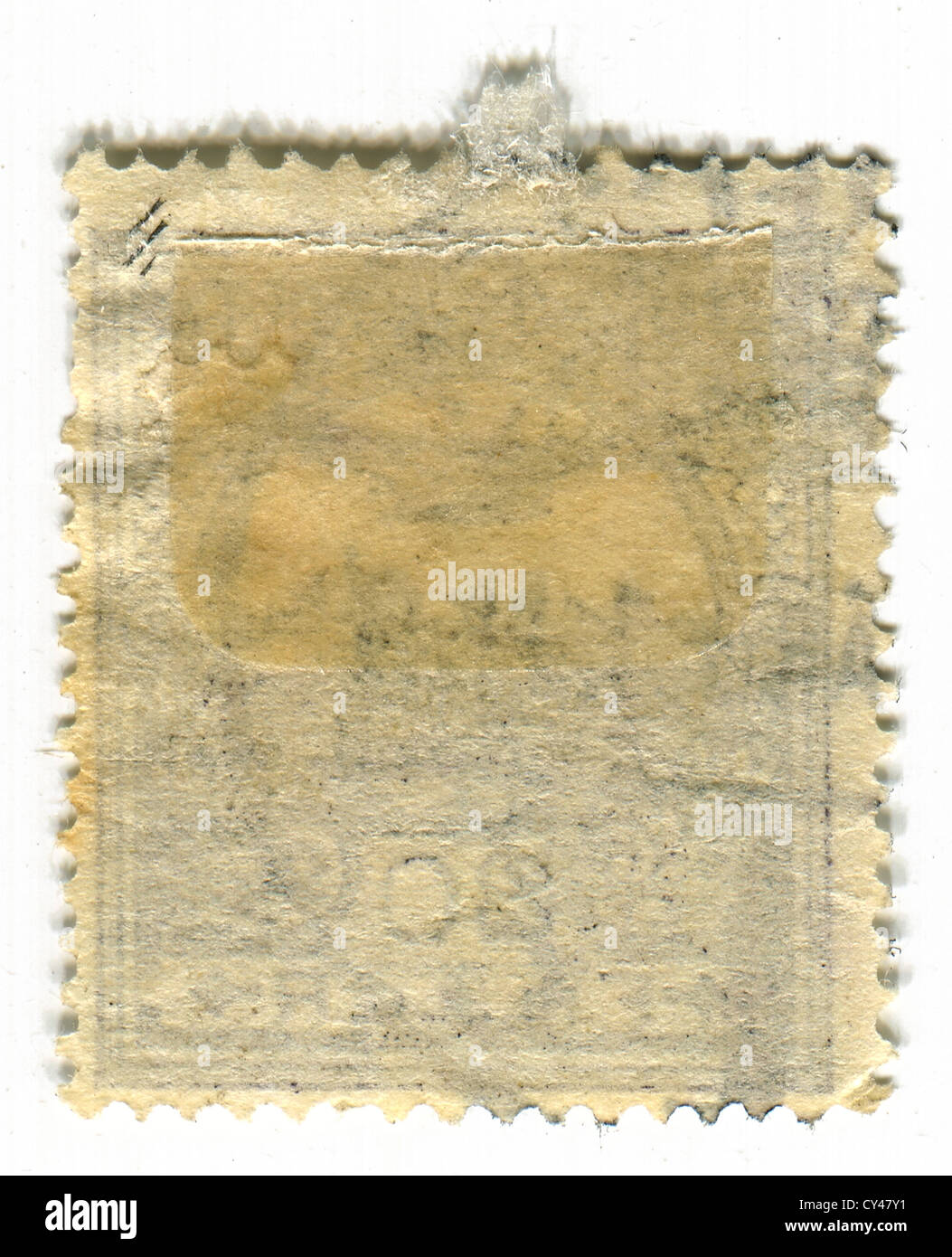 The reverse side of a postage stamp Stock Photo - Alamy