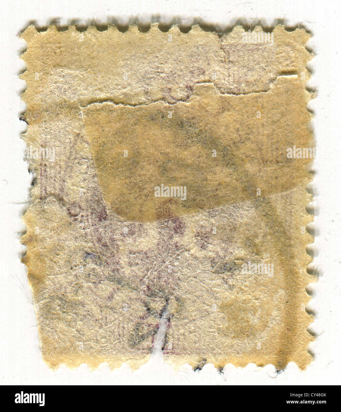 The reverse side of a postage stamp Stock Photo - Alamy