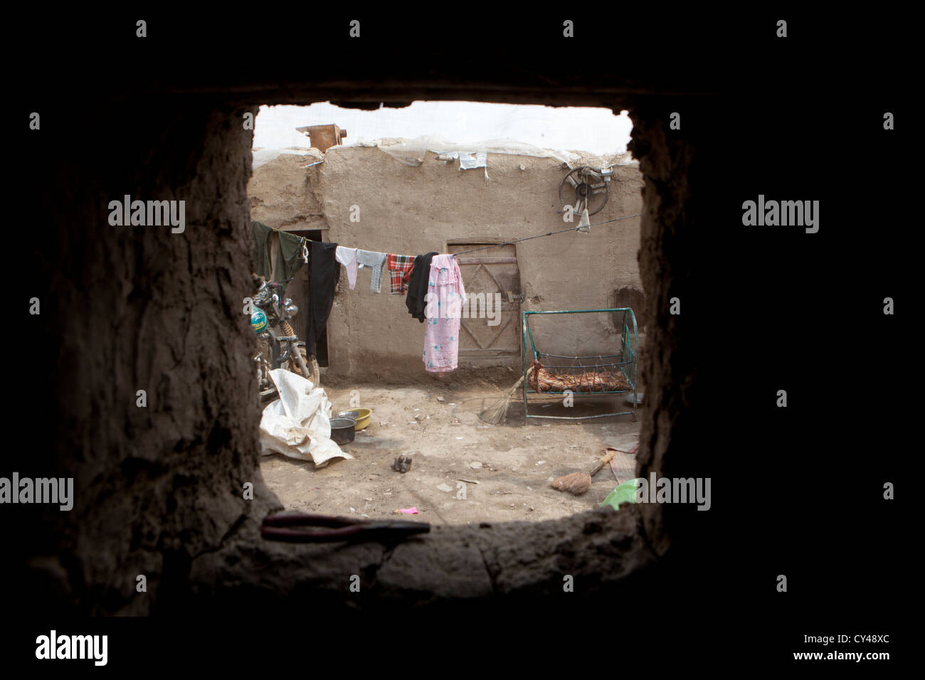 window of a slumhouse in Afghanistan Stock Photo - Alamy