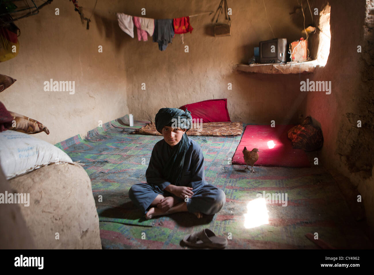 Afghan boy in a traditional afghan house in kabul Stock Photo - Alamy