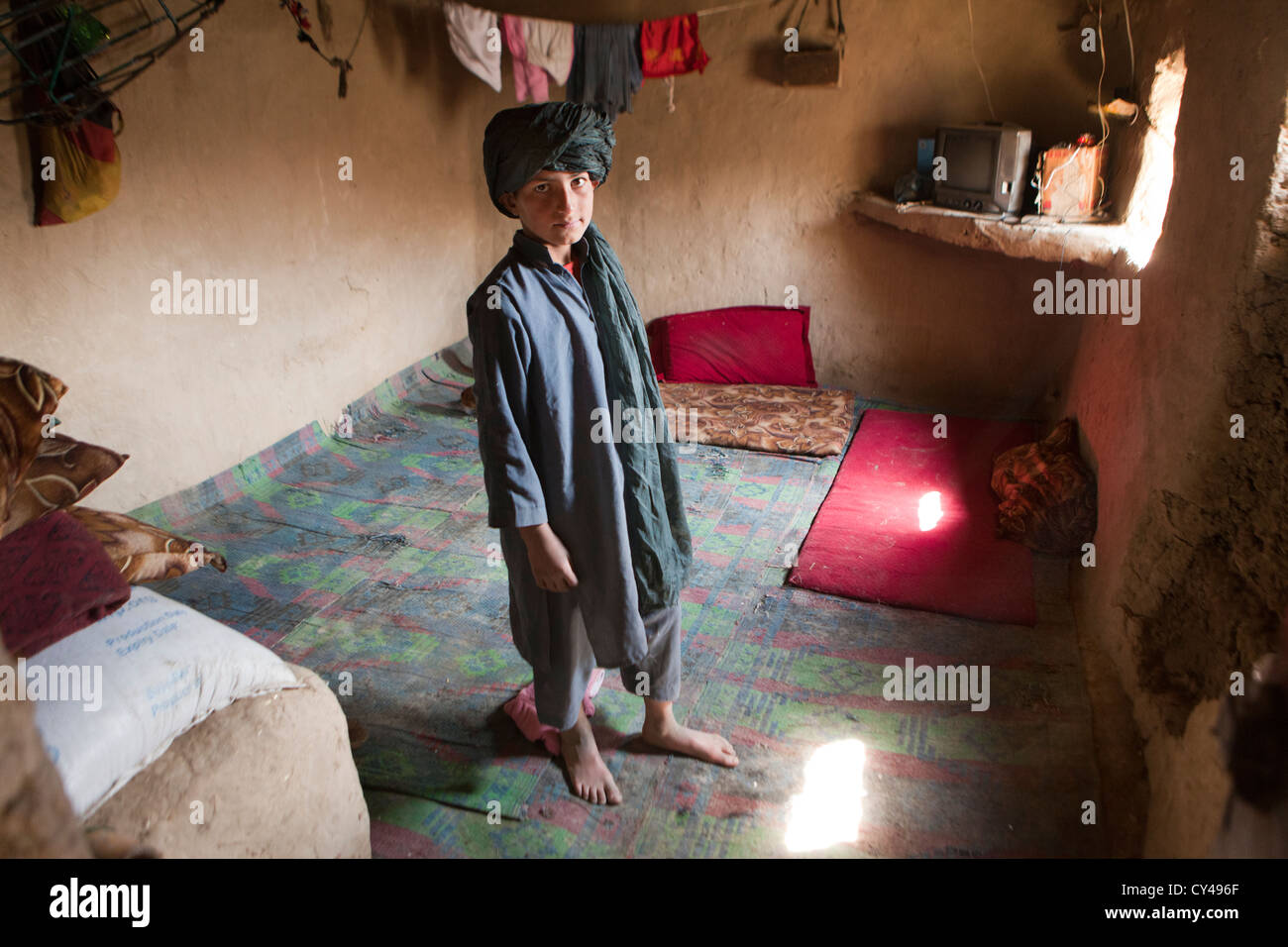 Afghan boy in a traditional afghan house in kabul Stock Photo - Alamy