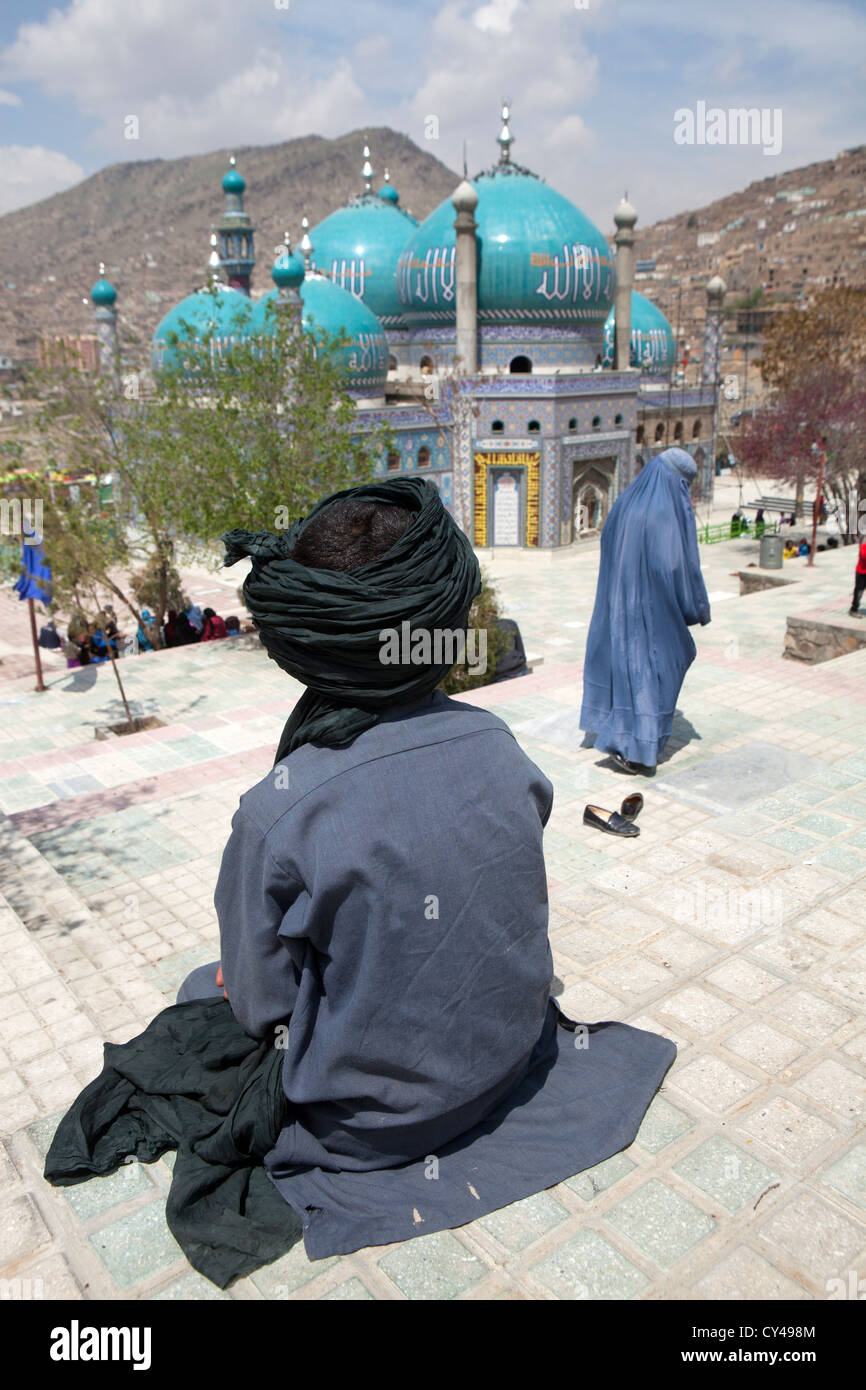 Afghan boy in front of a shia mosque in kabul Stock Photo - Alamy