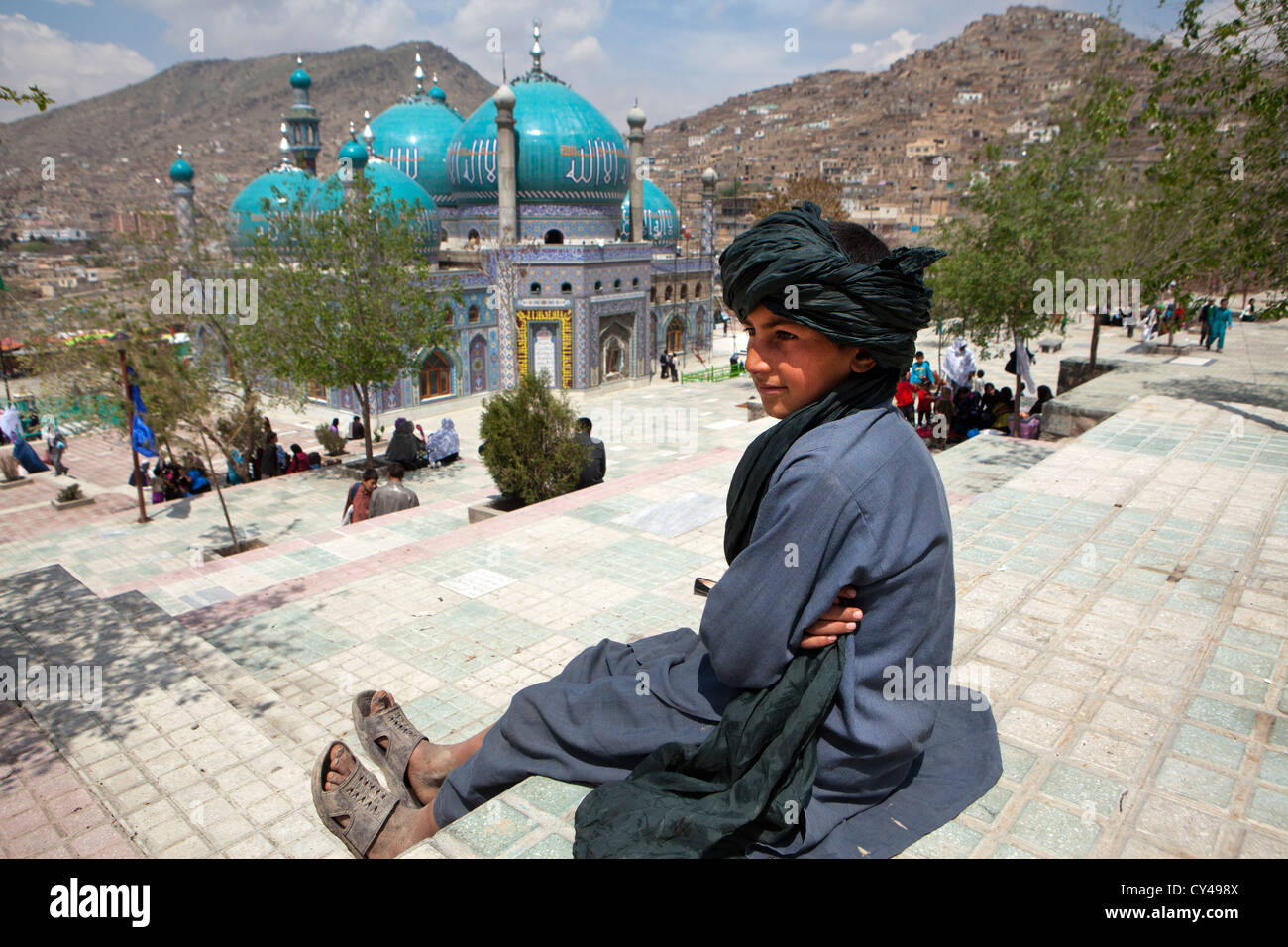 Afghan boy in front of a shia mosque in kabul Stock Photo - Alamy