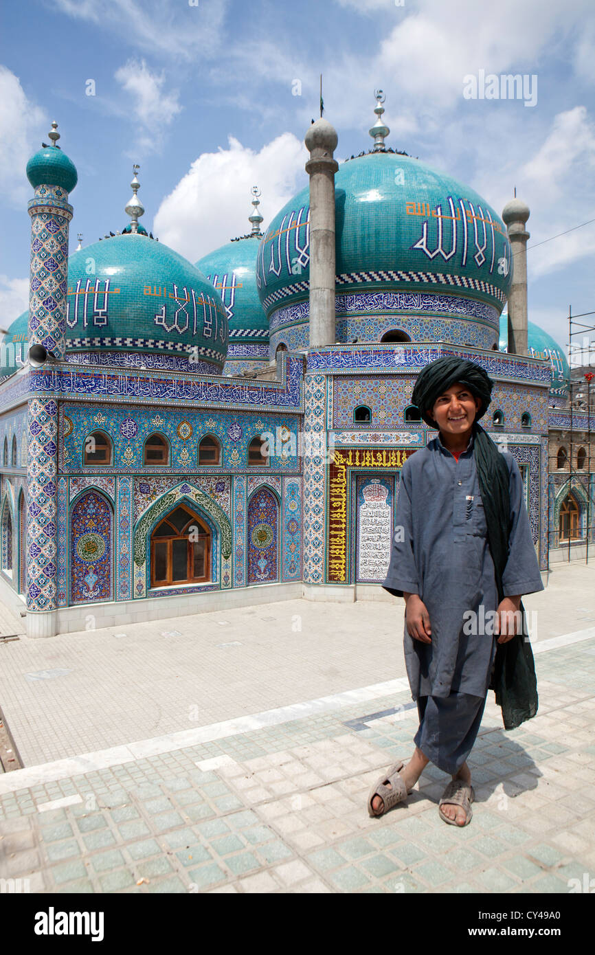 Afghan boy in front of a shia mosque in kabul Stock Photo - Alamy