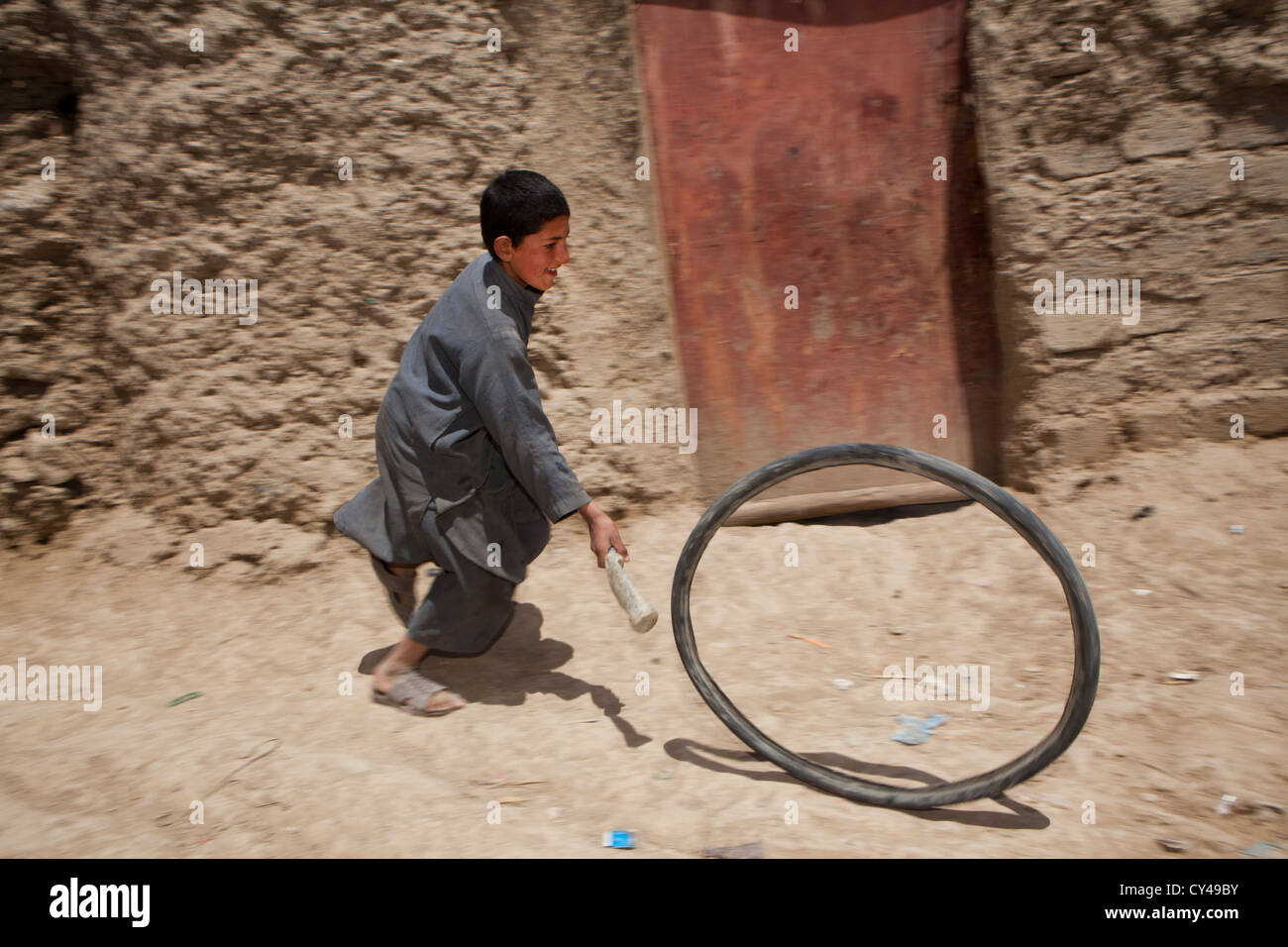 Afghan children playing in a slum in Kabul Stock Photo - Alamy