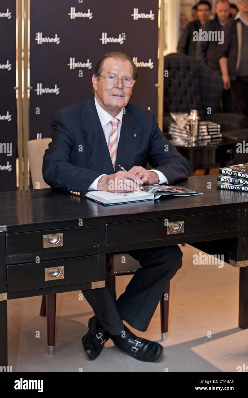 roger moore , actor, signs copies of his new book 'bond on bond' at ...