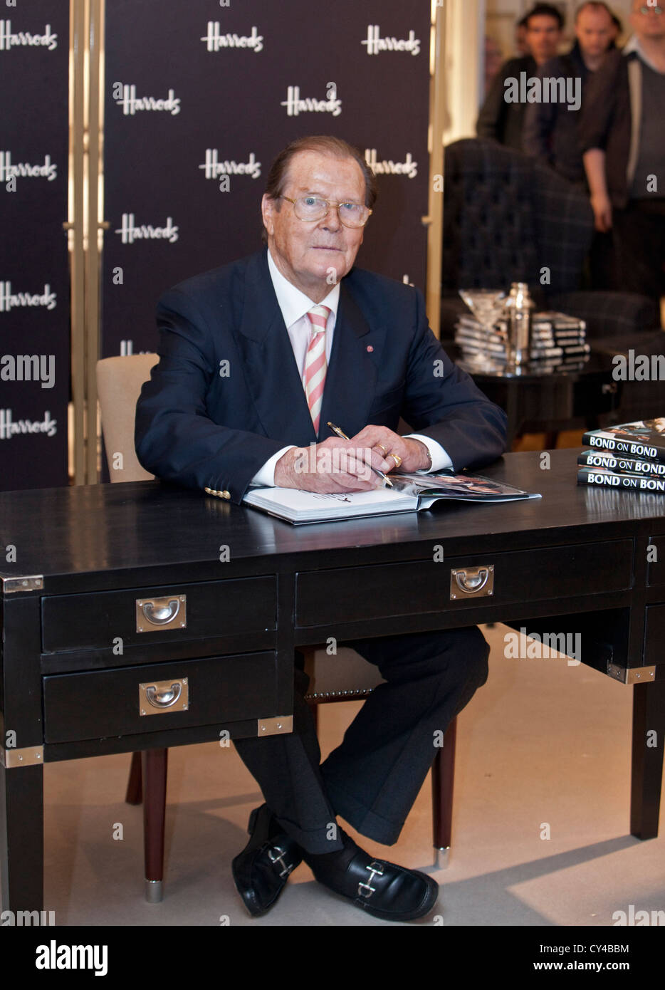 roger moore , actor, signs copies of his new book 'bond on bond' at ...