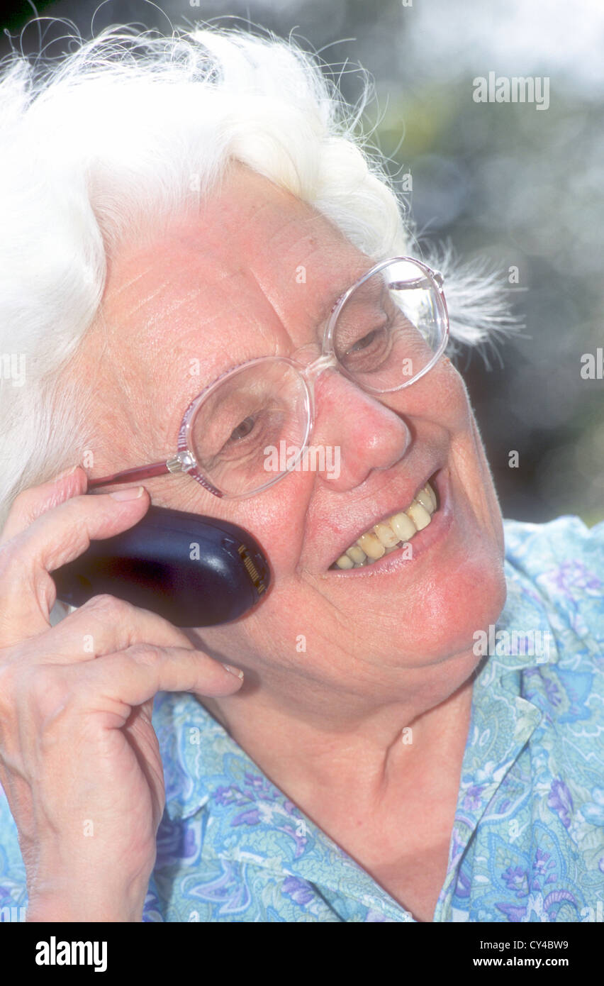Oap using a mobile phone hi-res stock photography and images - Alamy