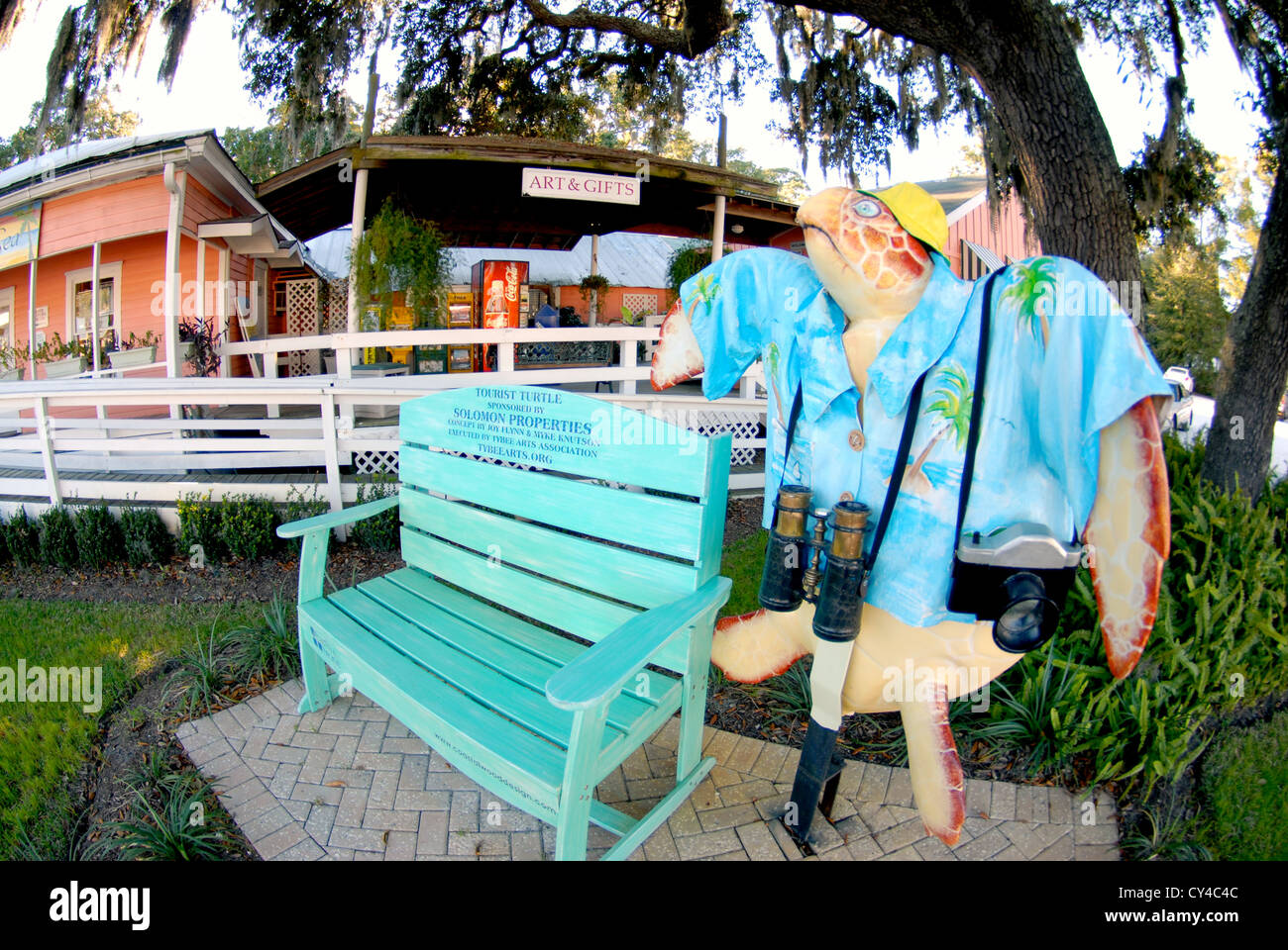 Turtle artwork dressed as a tourist Stock Photo - Alamy