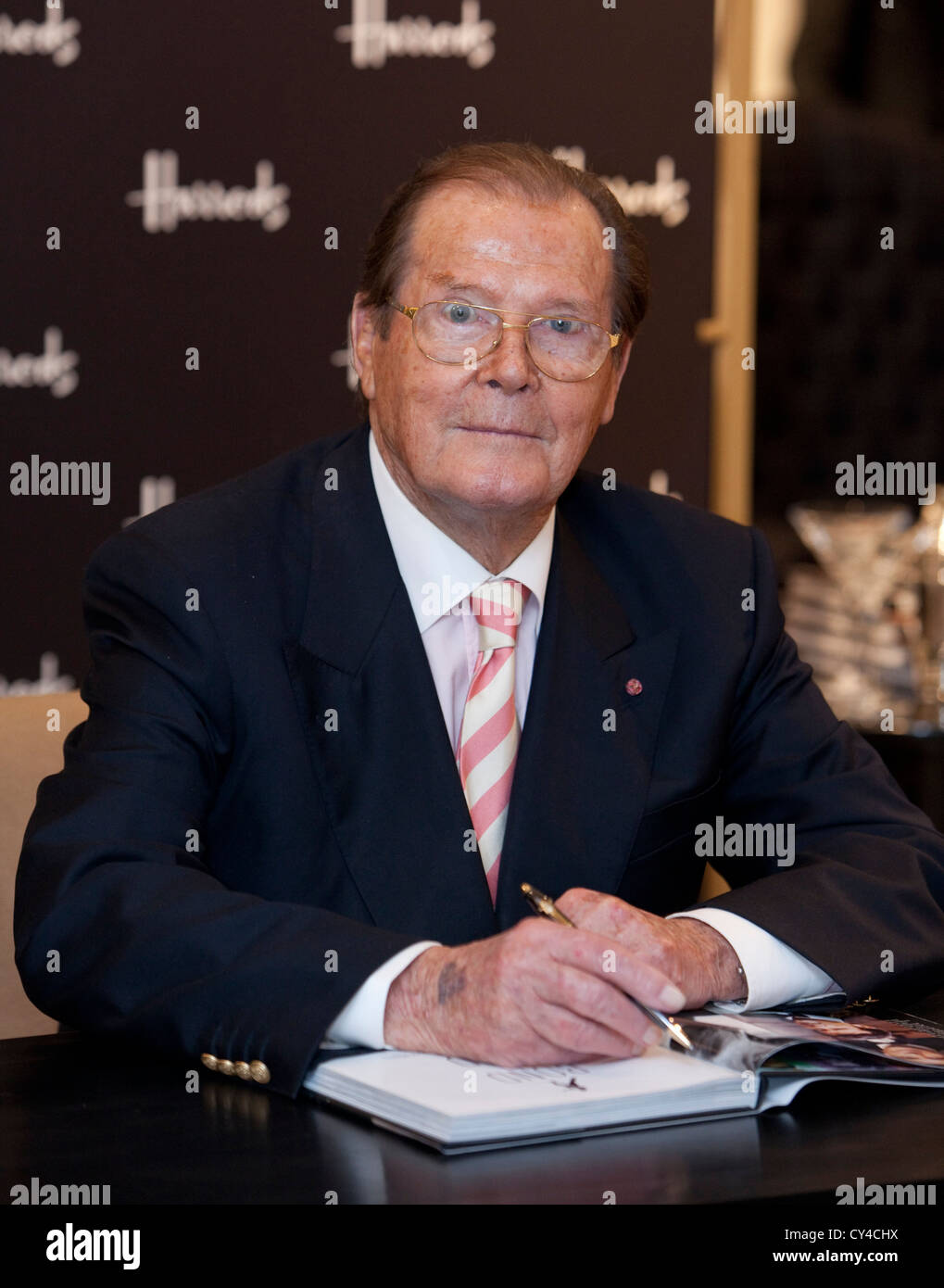 roger moore , actor, signs copies of his new book 'bond on bond' at ...