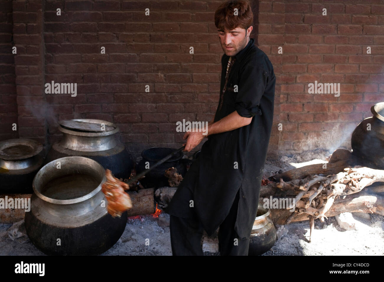Wazas, traditional Kashmiri cooks, prepare a Wazwan a Kashmiri feast ...