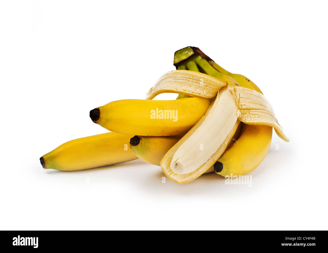 fresh bananas on a white background one pilled Stock Photo - Alamy