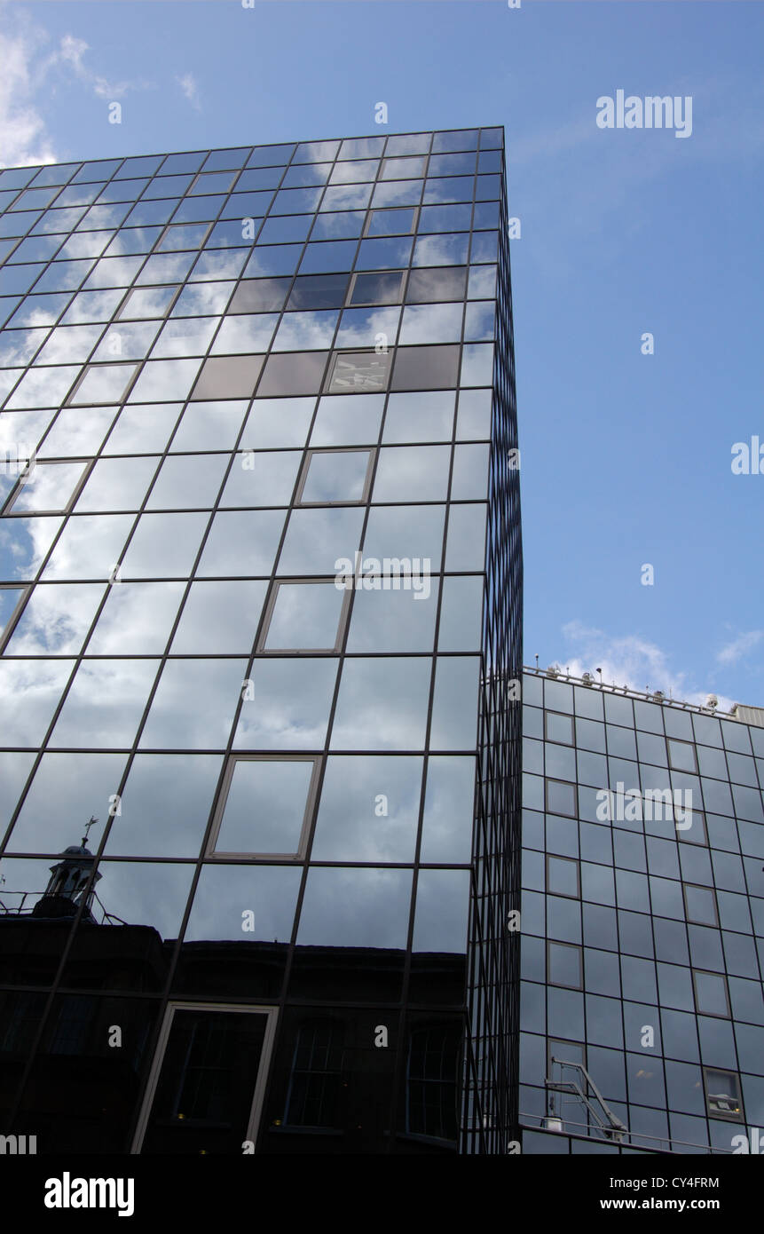 Reflection on glass wall of a modern office building Stock Photo - Alamy