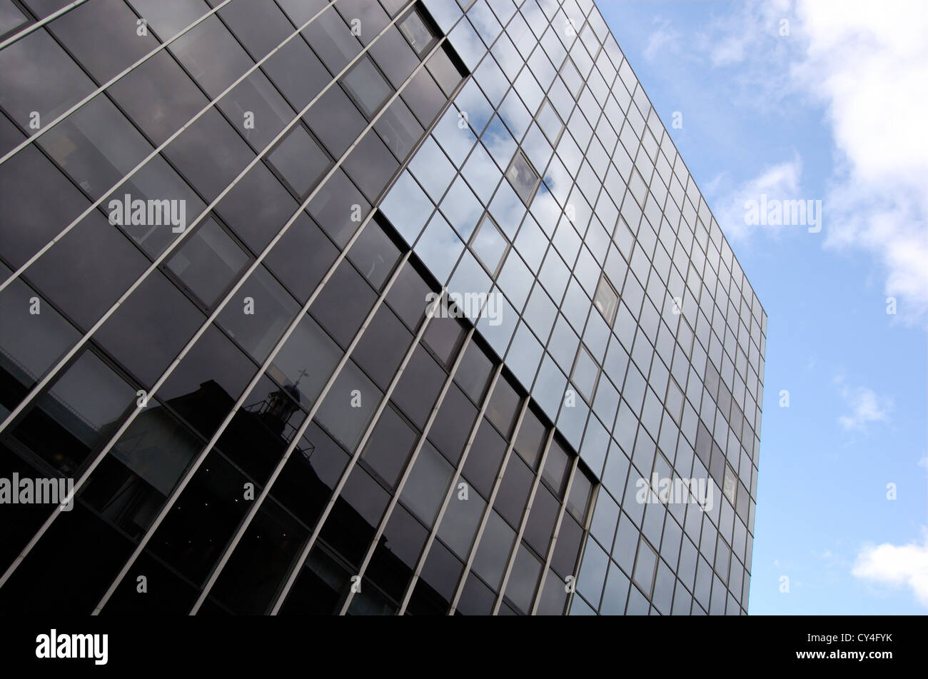 Reflection on glass wall of a modern office building Stock Photo - Alamy