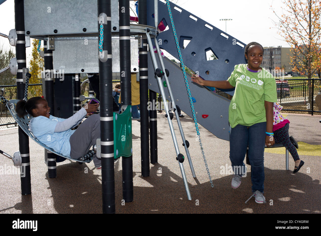 Children playing in a playground in a park in Newark New Jersey Stock ...