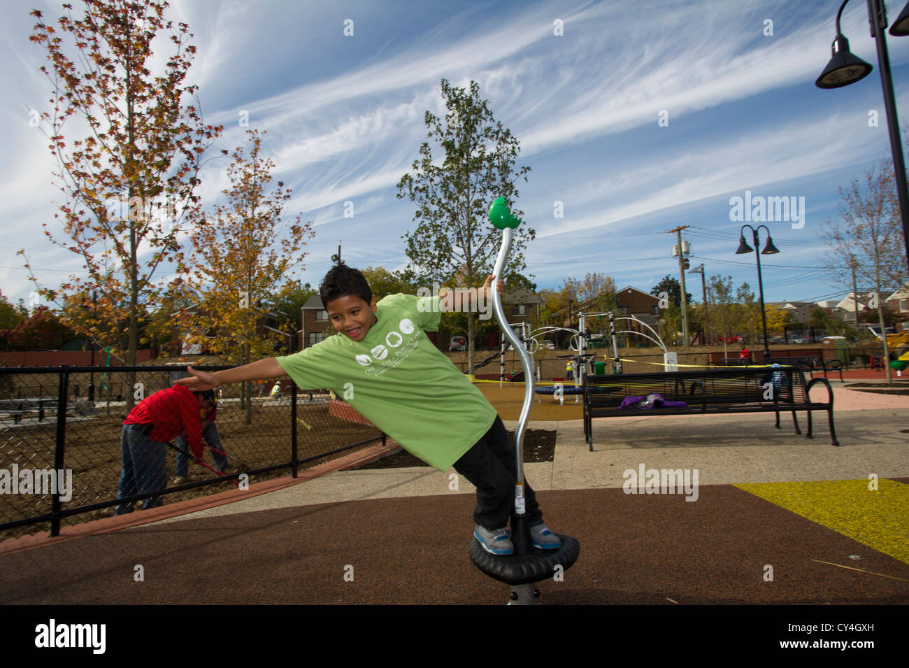 Kids playing at a playground in a park in Newark New Jersey Stock Photo ...