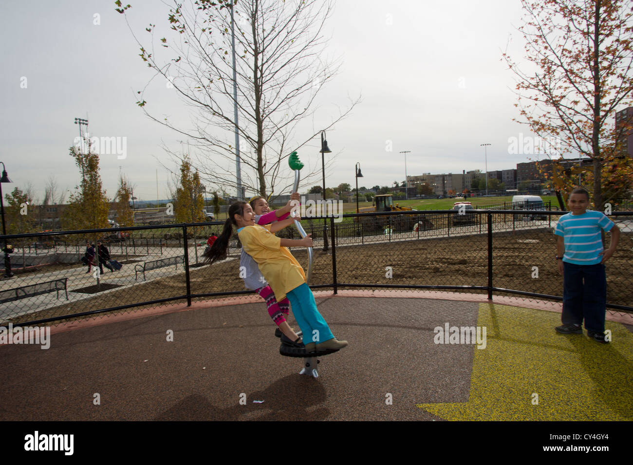 Kids playing in a playground in a park in Newark New Jersey Stock Photo ...