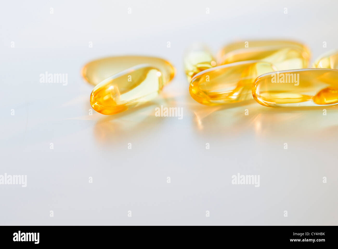 Omega fatty acid pills on white background, studio shot Stock Photo - Alamy