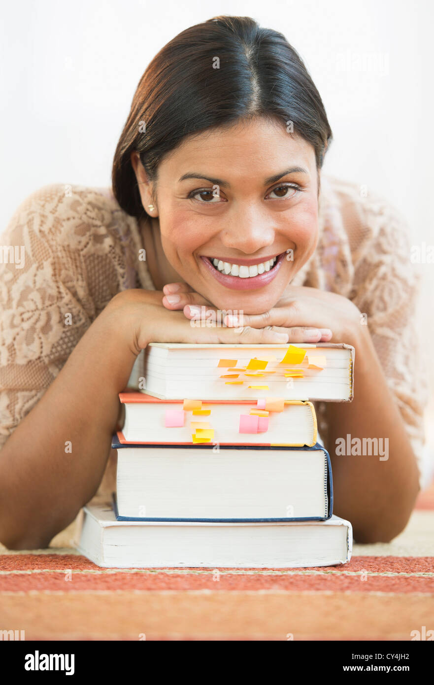 USA, New Jersey, Jersey City, Portrait of female student leaning on ...