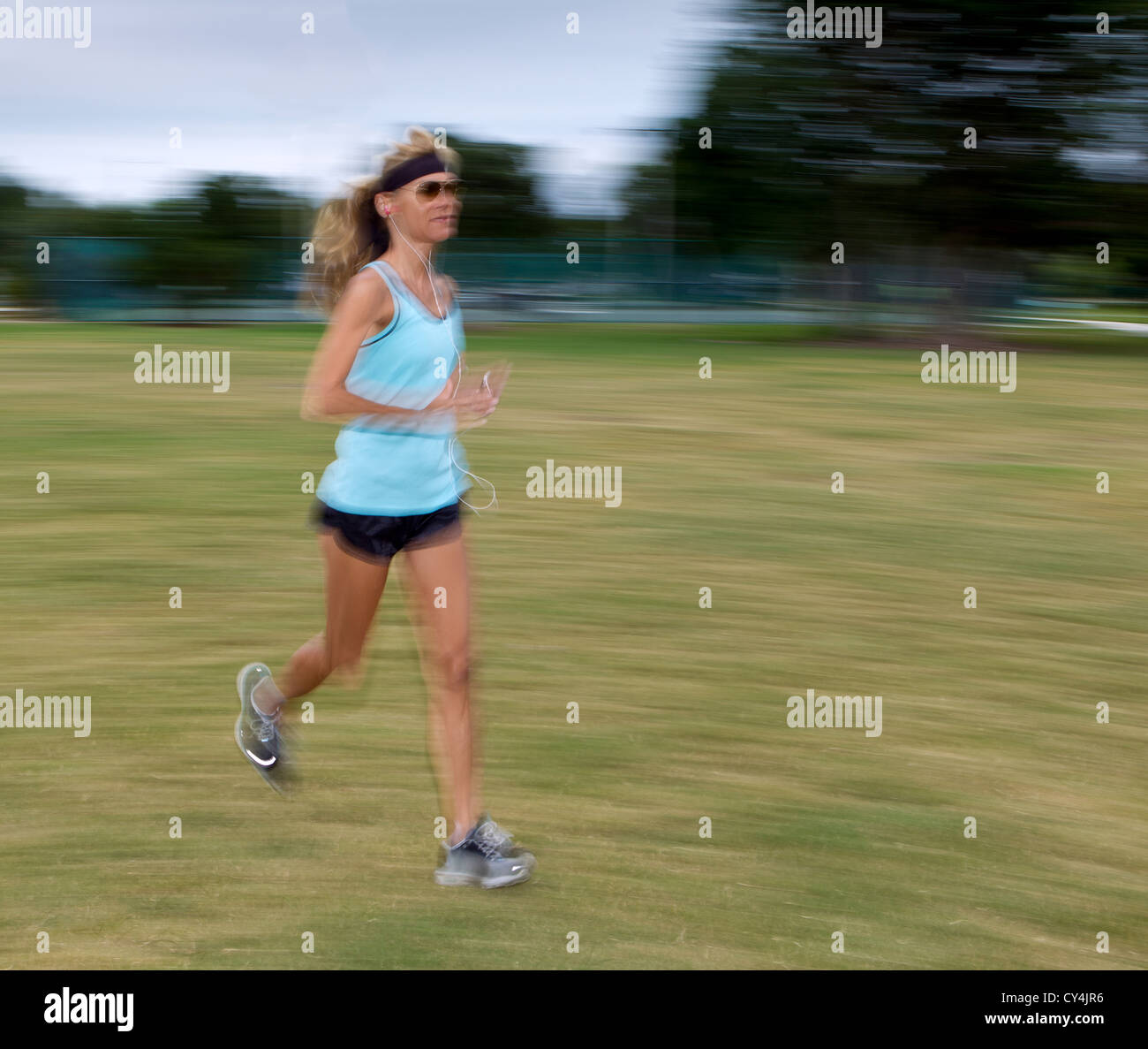 Keeping fit by running Stock Photo - Alamy