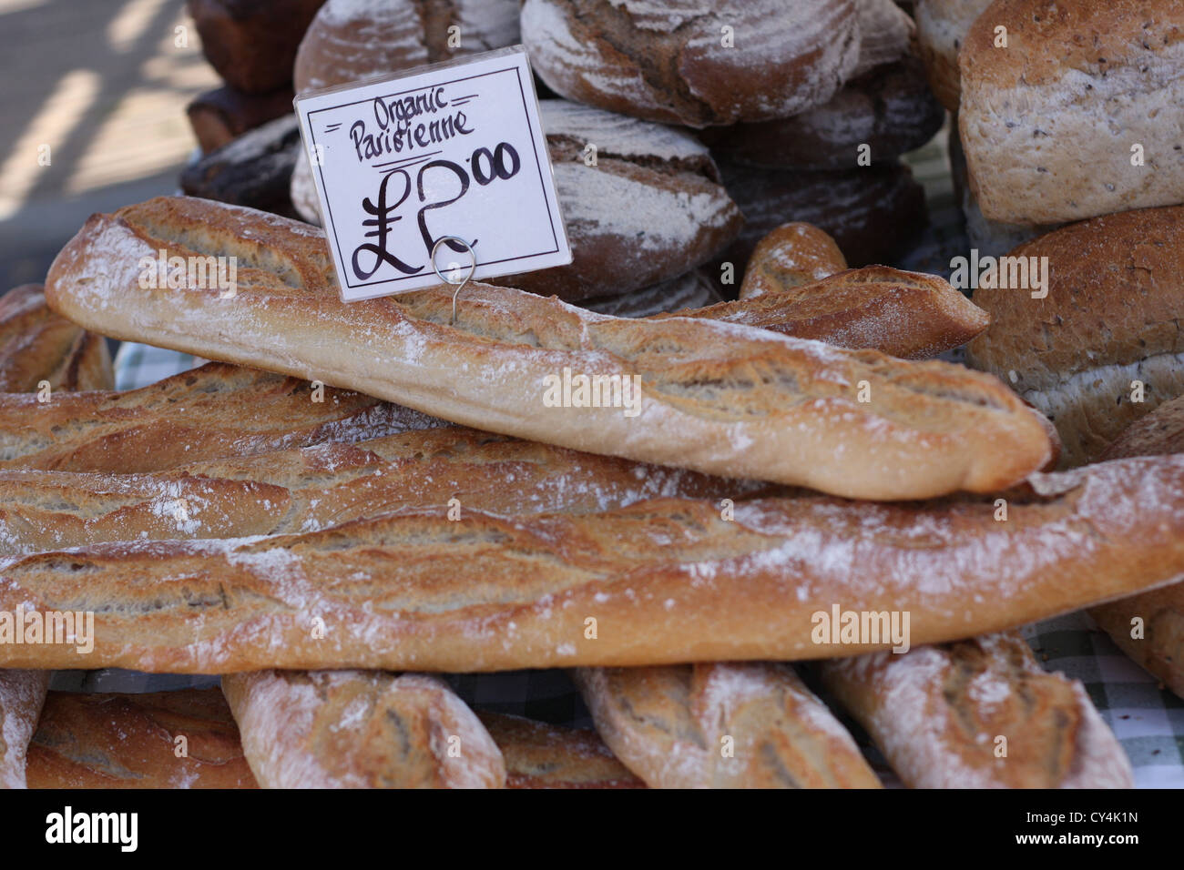 Fresh bread on market stall Stock Photo - Alamy