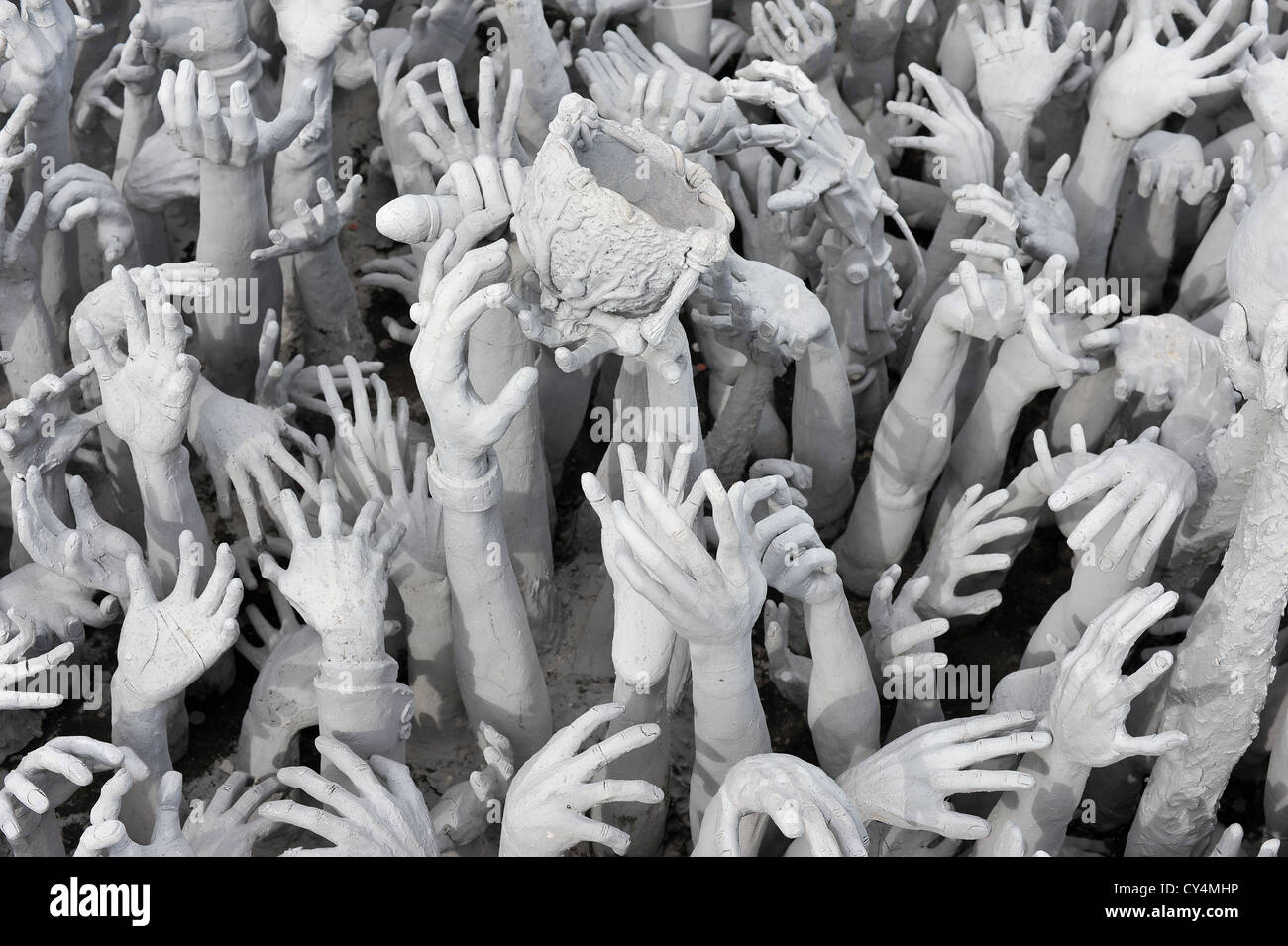 Abstract hands statue from Hell in Wat Rong Khun at Chiang Rai of ...