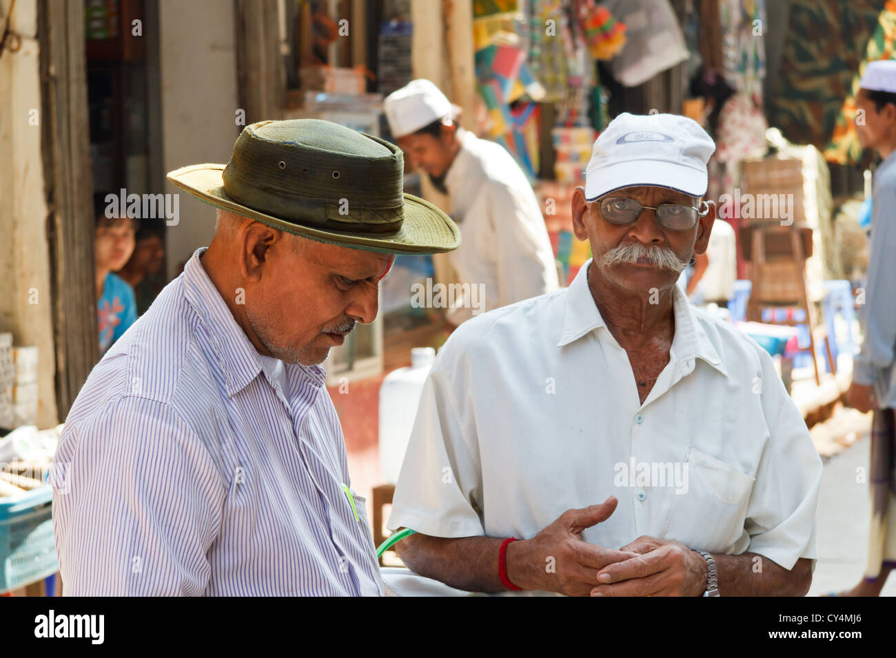 Two Men in the Streets of Rangoon, Myanmar Stock Photo - Alamy
