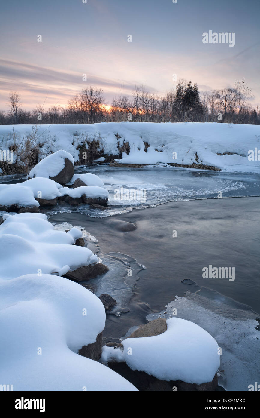 Winter landscape with a river Stock Photo - Alamy