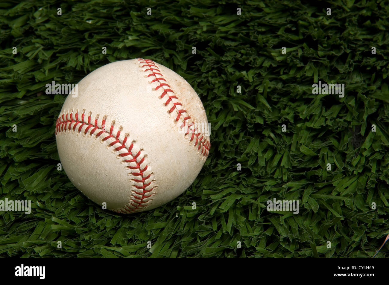 Baseball laying on grass hi-res stock photography and images - Alamy