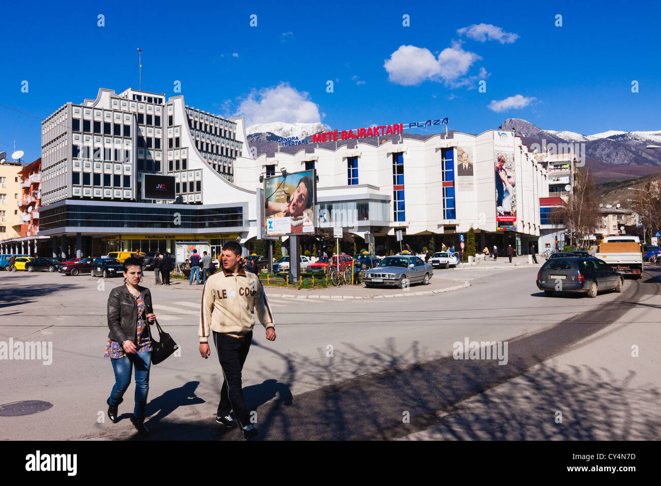 People in modern part of town, Peja, Kosovo Stock Photo - Alamy