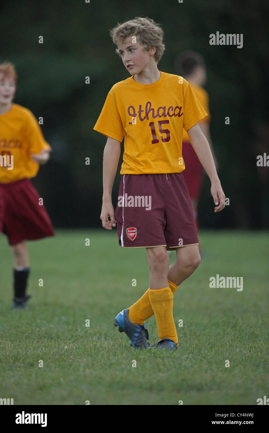 Boy on soccer field Stock Photo - Alamy