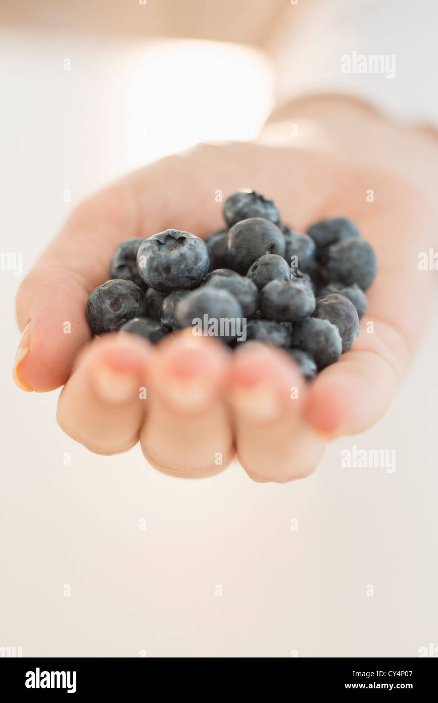 Hand blueberry hi-res stock photography and images - Alamy