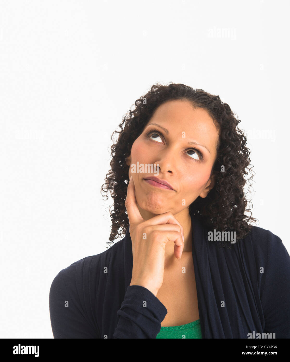 Studio shot of woman contemplating Stock Photo - Alamy