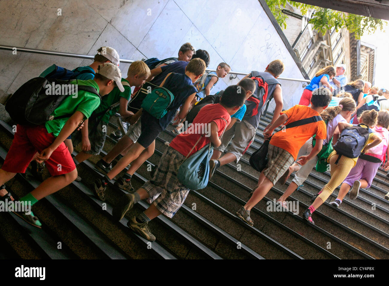 School children climbing the stairs from a subway in Budapest Stock ...