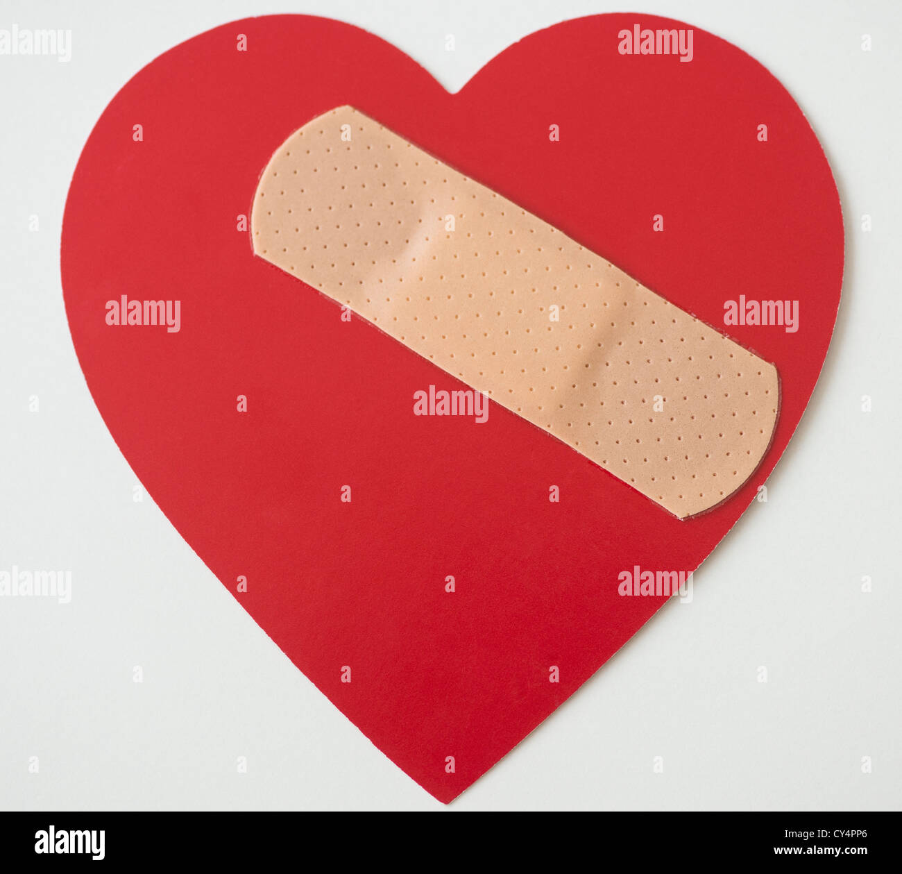 Broken heart with bandage hi-res stock photography and images - Alamy