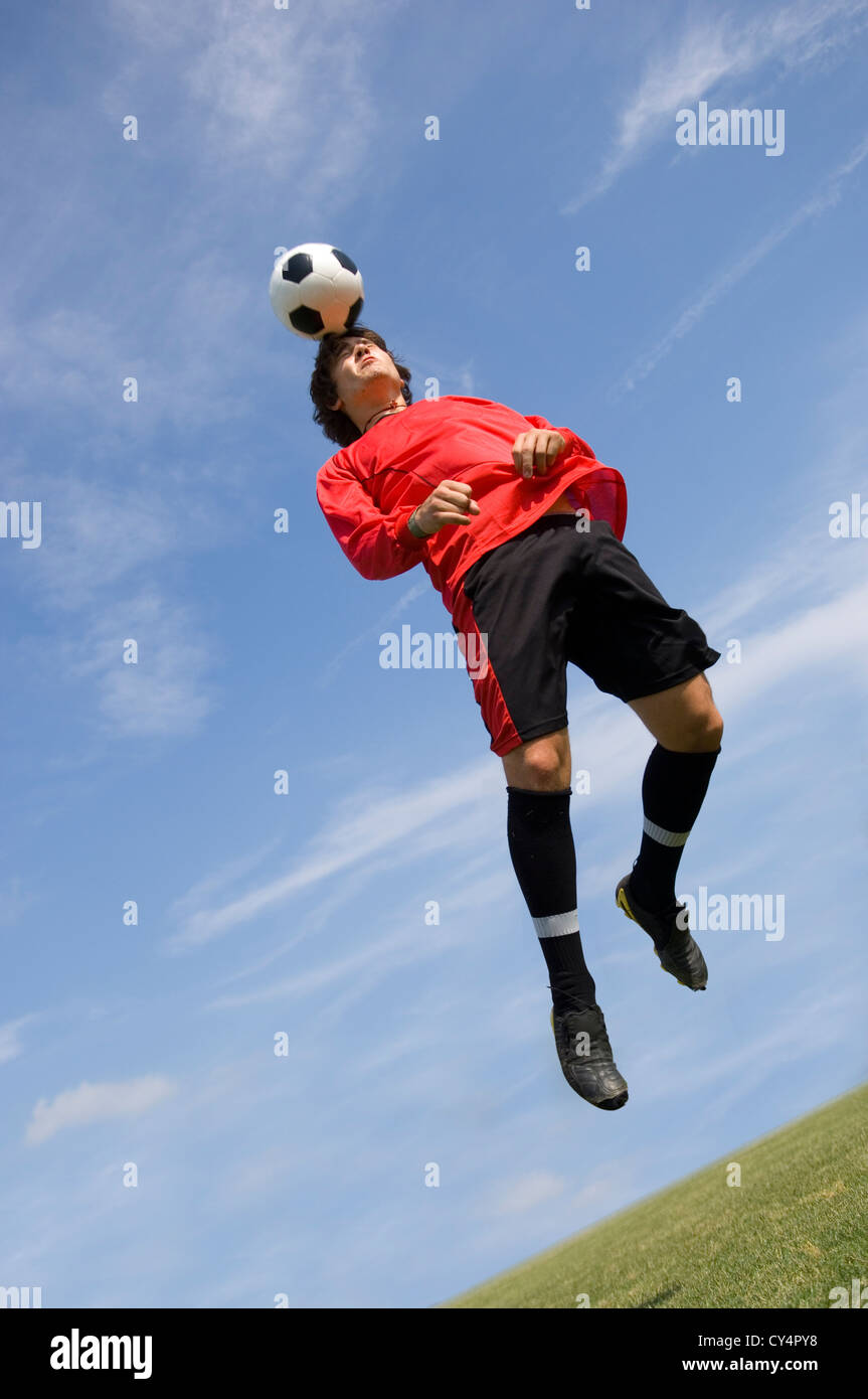 Soccer - Football Player making header Stock Photo - Alamy